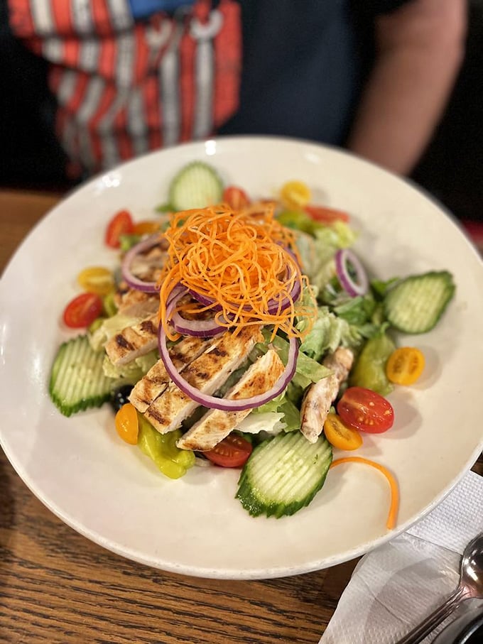 A salad at an ice cream parlor is like bringing an umbrella to the desert—surprisingly practical and secretly brilliant.