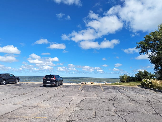 The view from Jolly Rogers' parking area reminds you that Lake Erie isn't just a pretty backdrop—it's the source of your lunch.