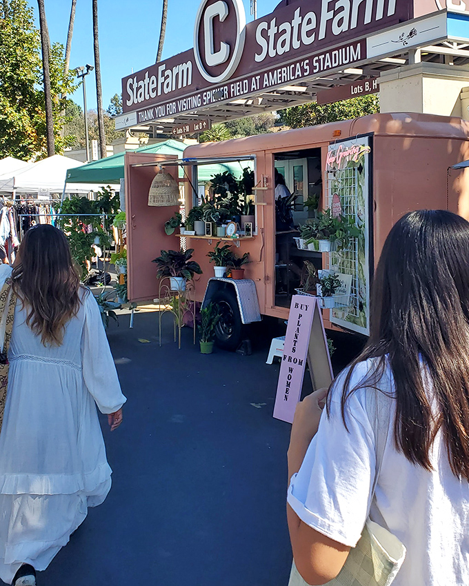 Plant shopping goes mobile at this pink trailer greenhouse. Impulse purchases of greenery have never been more justified.