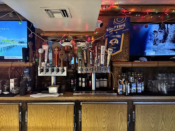 The bar stands ready for service, beer taps gleaming like soldiers at attention, waiting to quench the thirst of tiki adventurers.