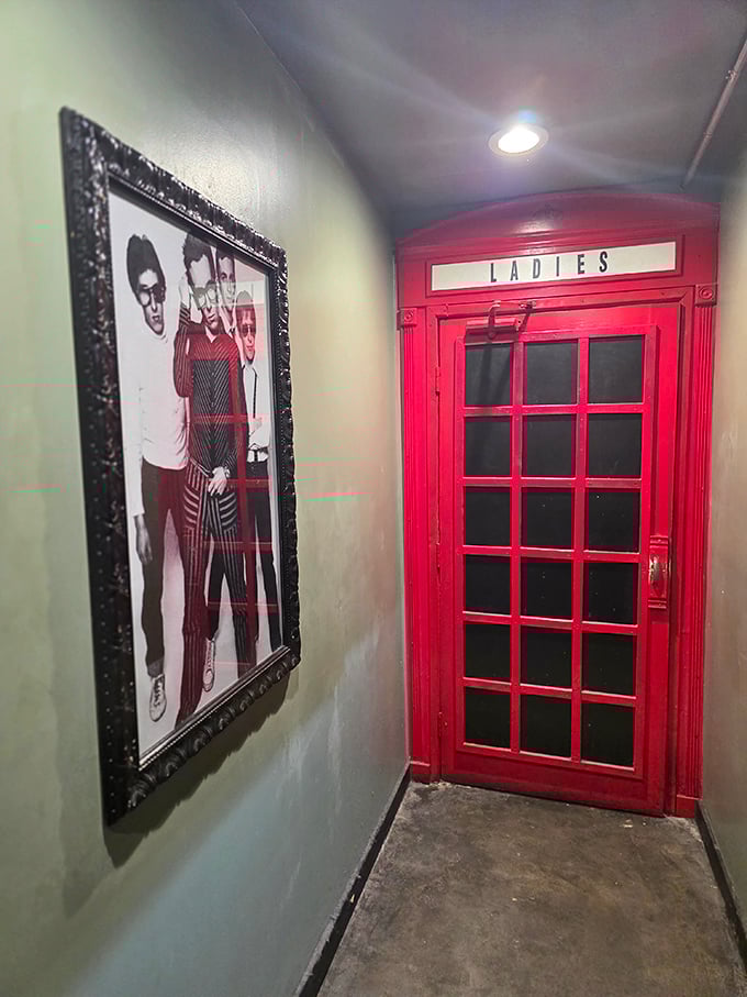 Even the restroom embraces British charm with a red telephone booth door. Doctor Who fans might check if it's bigger on the inside.