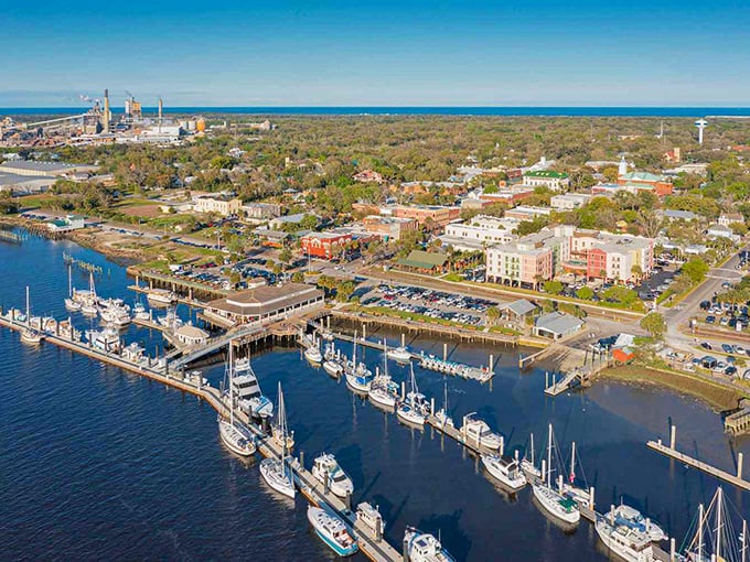 The marina view reveals Fernandina's dual personality—a working waterfront where shrimp boats and pleasure craft share the same stunning coastal backdrop.