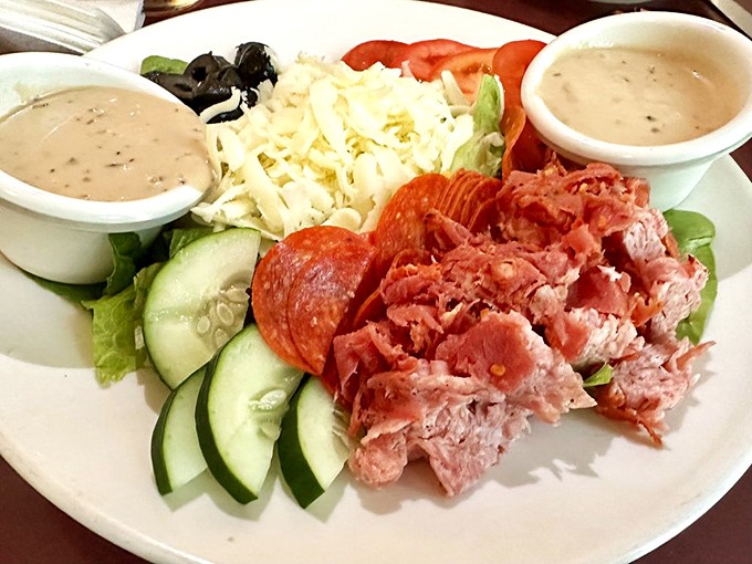 The antipasto salad – a colorful playground where vegetables, meats and cheeses come together for the most delicious recess ever.