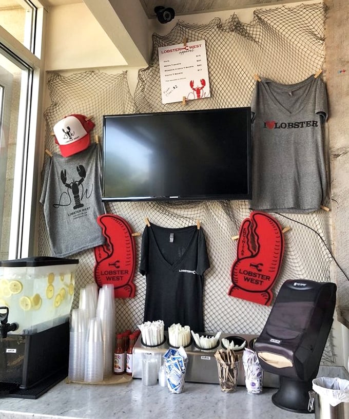 Fishing nets display Lobster West's branded gear—proof that when you've created something truly special, people want to wear the t-shirt. The ultimate souvenir for seafood aficionados.