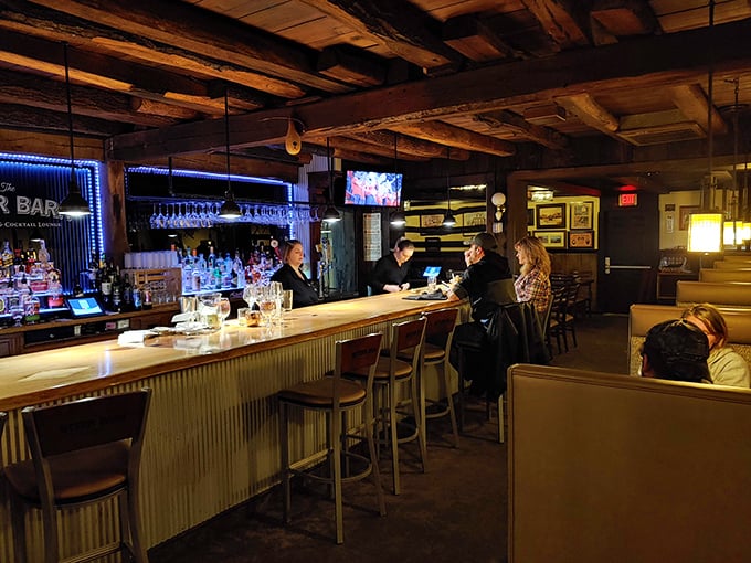 The bar where Old Fashioneds are poured with precision and strangers become friends over tales of the best steaks they've ever had.
