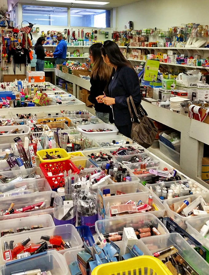 The beauty product section – where tiny plastic bins create a colorful mosaic of possibilities for makeup enthusiasts and bargain hunters alike.