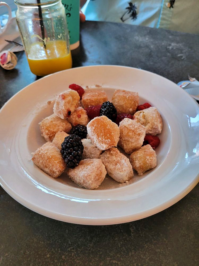 These beignets aren't just donuts that went to finishing school—they're pillowy confections that transport you to New Orleans without the airfare. 