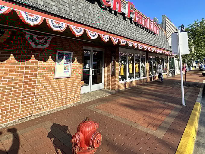 The Ben Franklin store continues the tradition of having everything you didn't know you needed. Those patriotic banners say "community" in red, white, and blue.