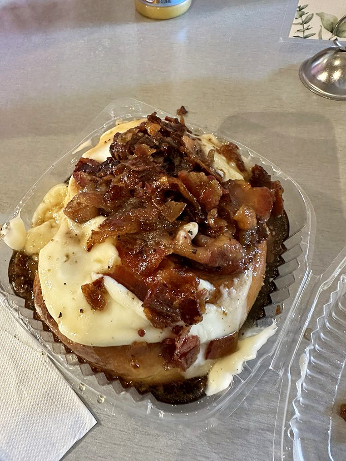 This bacon-topped cinnamon roll doesn't just break the rules—it creates new ones that make you question everything you thought you knew about breakfast.