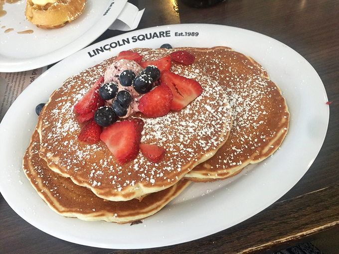 Berry-topped pancakes that look like they belong on a magazine cover. The fresh fruit isn't just healthy—it's nature's candy making breakfast feel like a justified indulgence.
