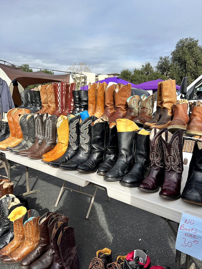 Boot boulevard! Each pair tells a story of dusty trails, dance floors, or motorcycle rides. The sign says none over 30°, but these beauties have seen much hotter days.