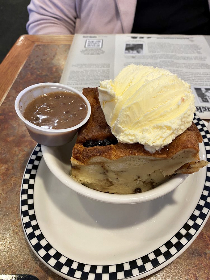 This bread pudding topped with vanilla ice cream and caramel sauce isn't just dessert—it's the grand finale to a meal that celebrates American comfort food.