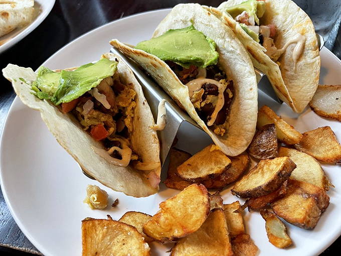 Breakfast tacos with home fries—proof that mornings don't have to be terrible, especially when avocado is involved.