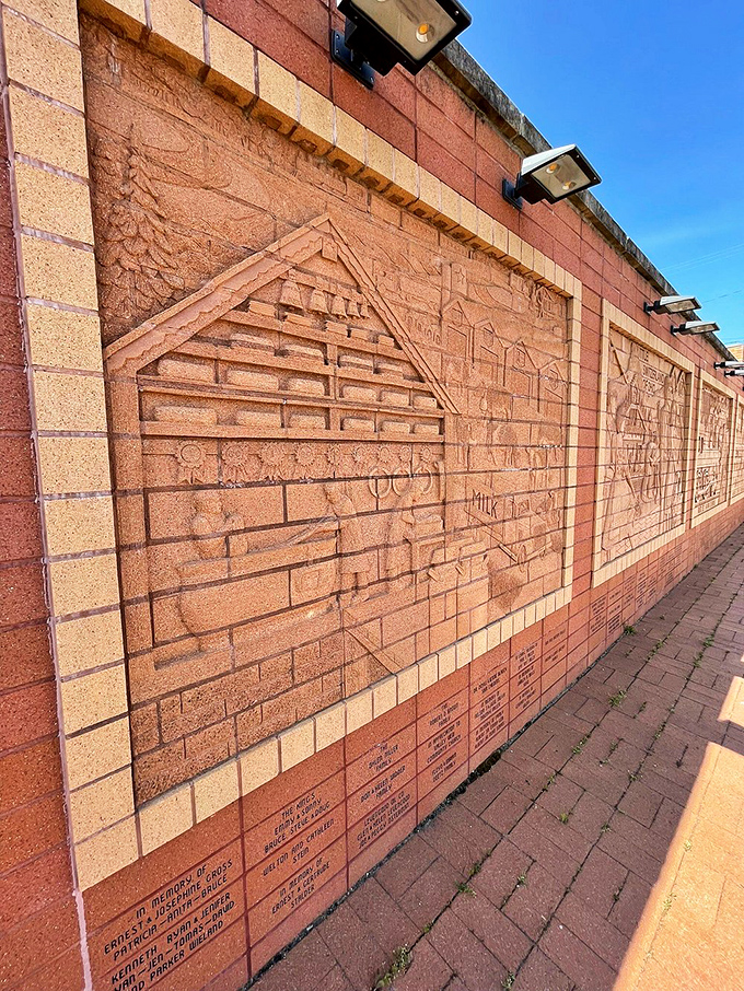 This brick wall sculpture tells Sugarcreek's story in stone—proof that before PowerPoint presentations, communities found more lasting ways to share their history.