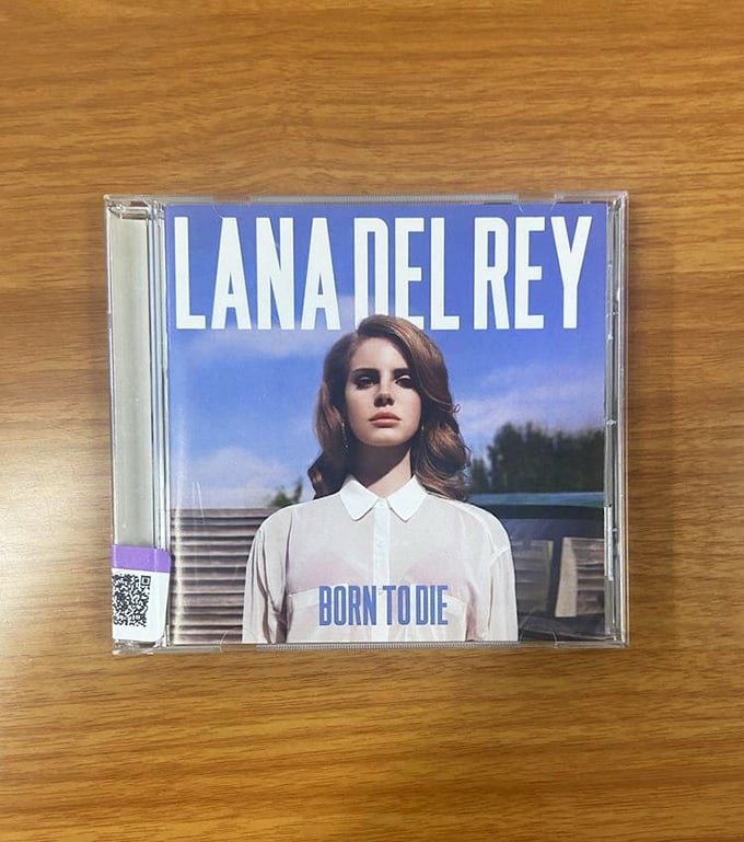 Musical treasures appear daily—this pristine Lana Del Rey CD represents thousands of discarded albums waiting for the vinyl-loving hipster or nostalgic collector.