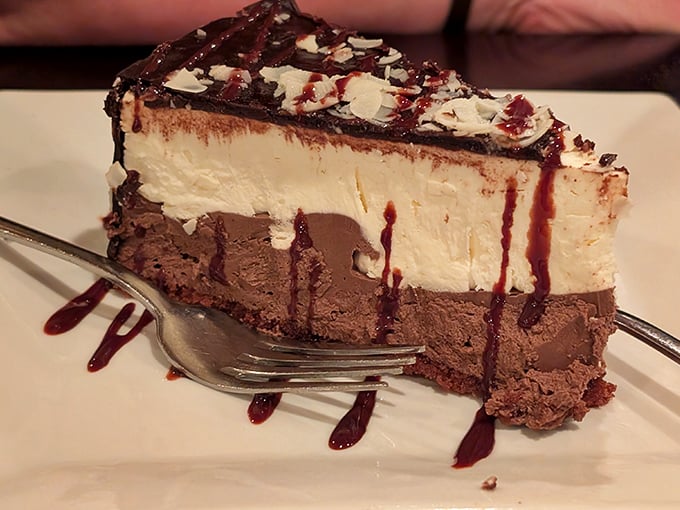 This chocolate and vanilla layer cake isn't just dessert—it's what happens when chocolate and vanilla stop fighting and make beautiful, delicious peace.