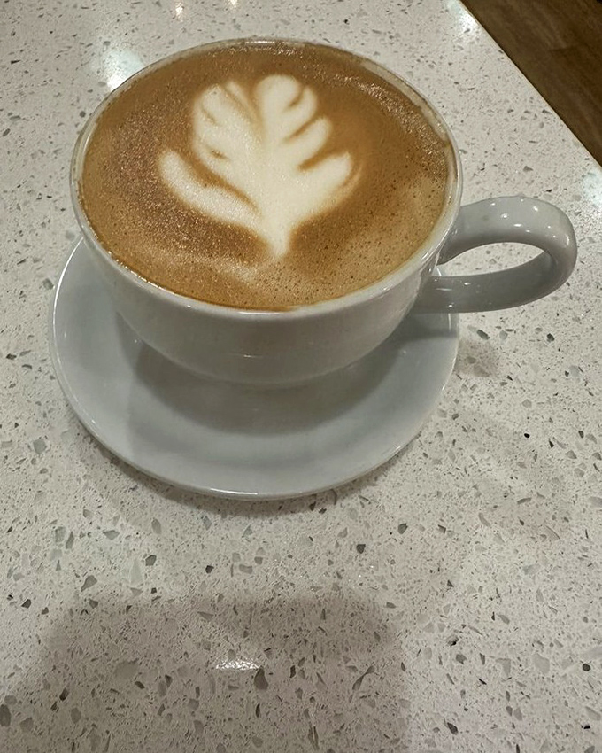 A cappuccino with latte art so pretty you almost don't want to drink it—almost, until the aroma reminds you that beauty is fleeting but caffeine is essential.