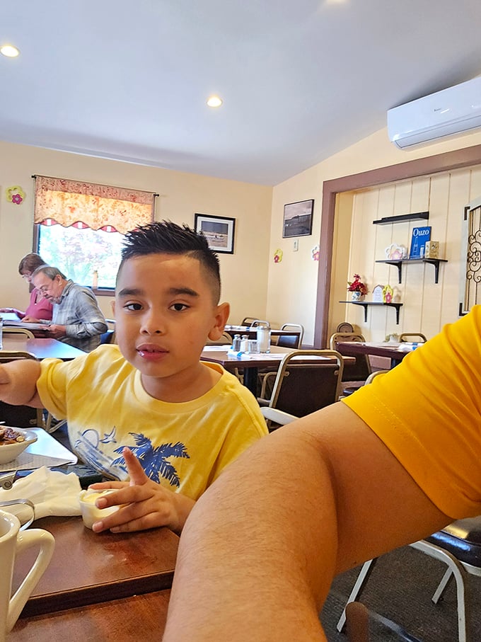 The diner's multi-generational appeal captured in one image – where breakfast traditions are passed down like family heirlooms.