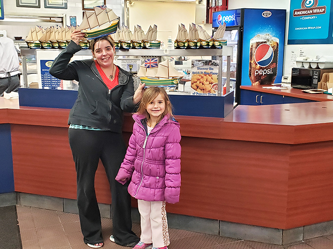 The joy of introducing a new generation to an old favorite. This isn't just a meal—it's the passing of a delicious torch to future fish and chips enthusiasts.
