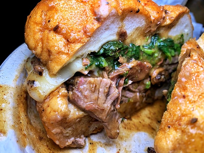 This isn't just lunch—it's a work of art. Tender meat, melted cheese, and broccoli rabe create the holy trinity of sandwich perfection.