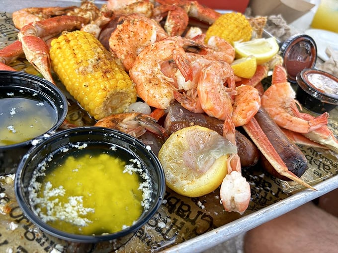 The seafood boil that launches a thousand napkins – where corn, potatoes, and shellfish come together in buttery, spicy harmony.