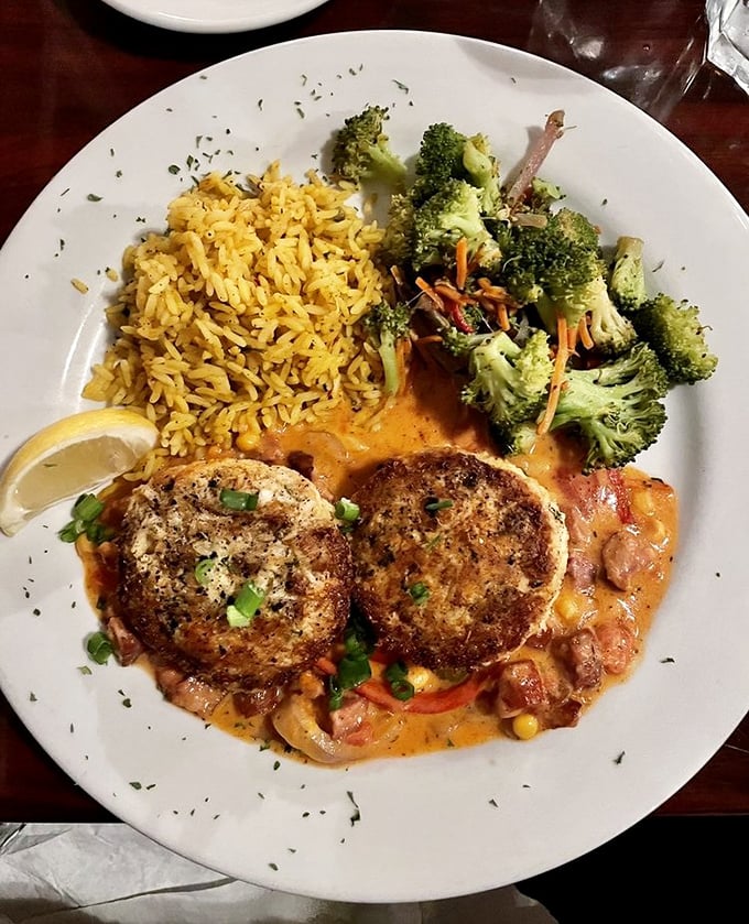Crab cakes that actually taste like crab—imagine that! Paired with colorful sides that prove vegetables can be more than an obligation on your plate.