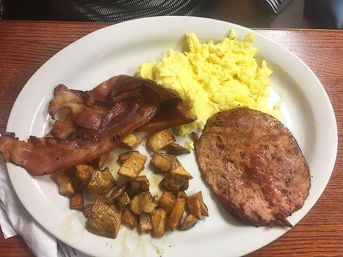 The double meat breakfast doesn't ask if you're hungry—it assumes you've arrived with an appetite worthy of its generous portions. Challenge accepted.