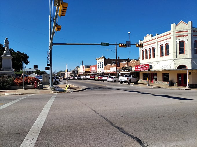 Llano's downtown intersection has witnessed first dates, parades, and the daily rhythm of small-town life—all under the watchful gaze of that courthouse clock tower.