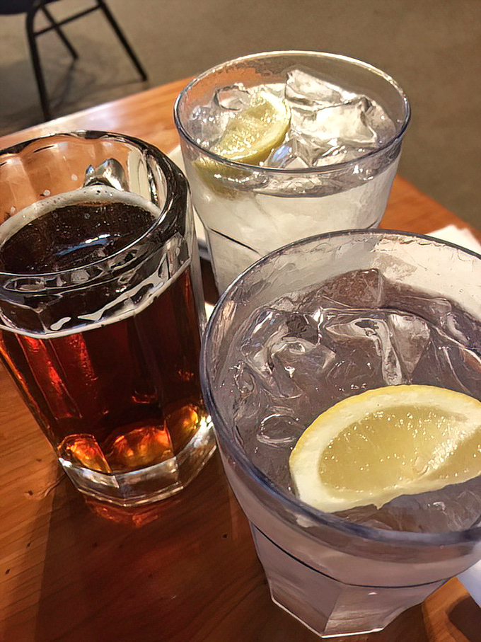 Cold drinks waiting to wash down Texas-sized portions—because tackling a meal at J W's requires proper hydration and possibly stretchy pants.