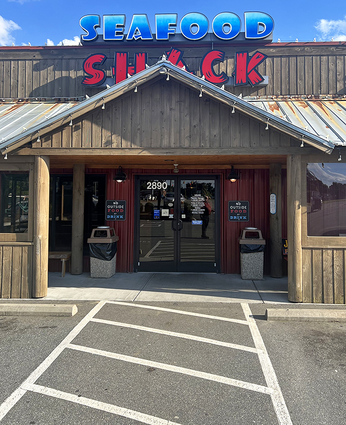 The entrance to seafood paradise, where that bright blue sign serves as North Carolina's answer to the Pearly Gates.