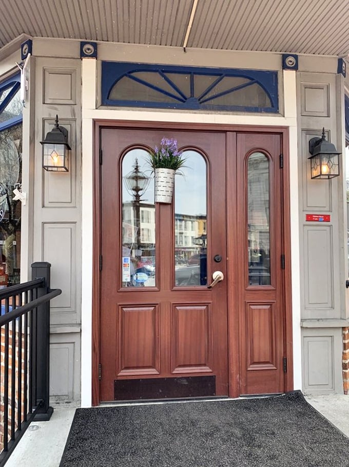 The wooden entrance looks like it could tell stories spanning centuries, welcoming modern-day visitors to a feast with historical flair.