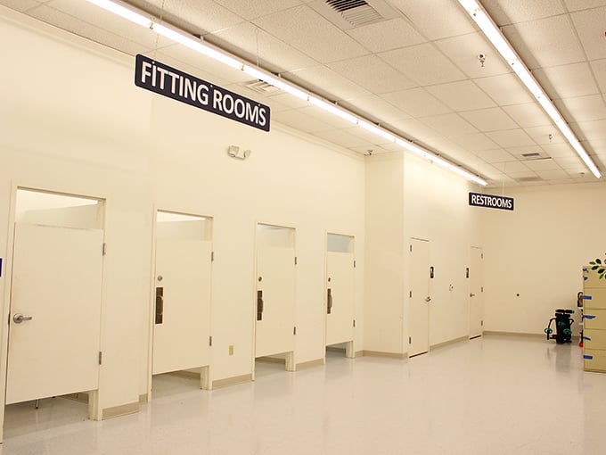 Clean, bright fitting rooms that eliminate the guesswork—because "looks great on the hanger" and "looks great on me" are different concepts.