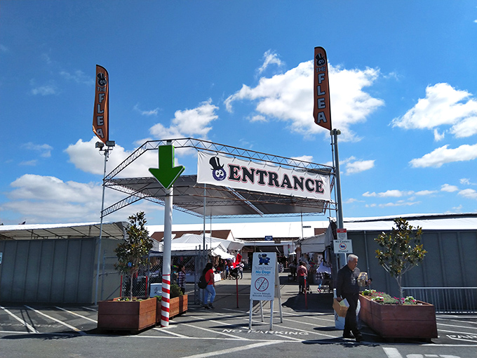 The entrance arch stands like a portal to retail adventure—step through and prepare for a day of discoveries and delights.