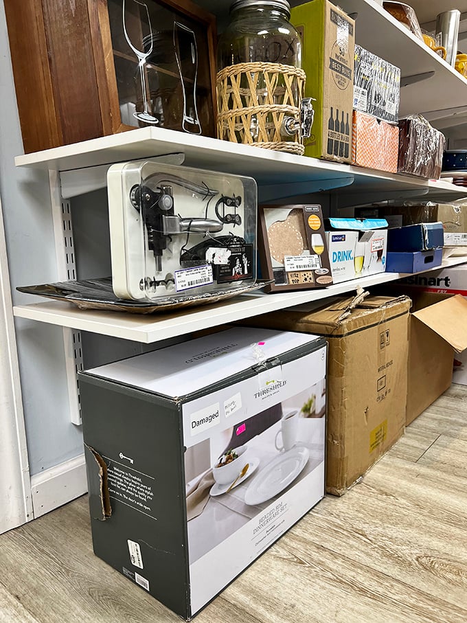 Kitchen treasures await new homes! That slightly damaged dinnerware box holds perfectly good plates inside—a metaphor for secondhand shopping if ever there was one.