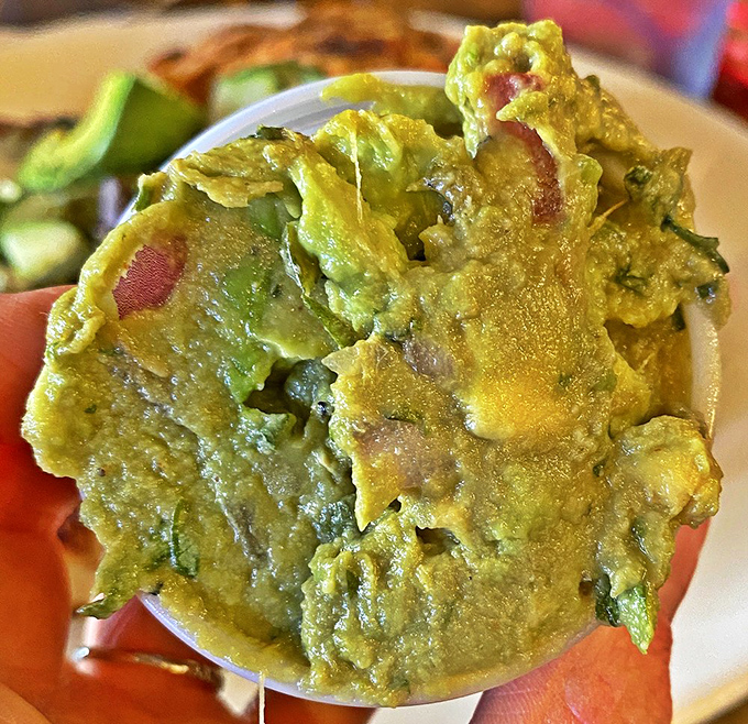 This isn't just guacamole—it's a vibrant, chunky avocado masterpiece that makes store-bought versions hang their heads in shame.
