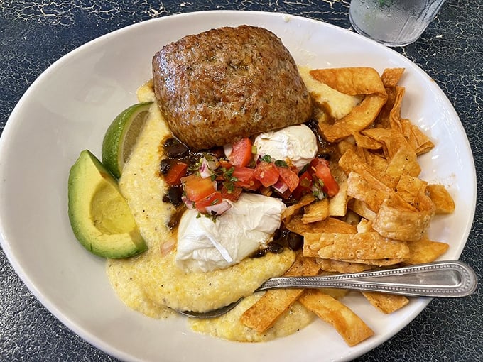 A fiesta on a plate—creamy grits, fresh avocado, and perfectly cooked eggs create a morning masterpiece. Breakfast without borders.
