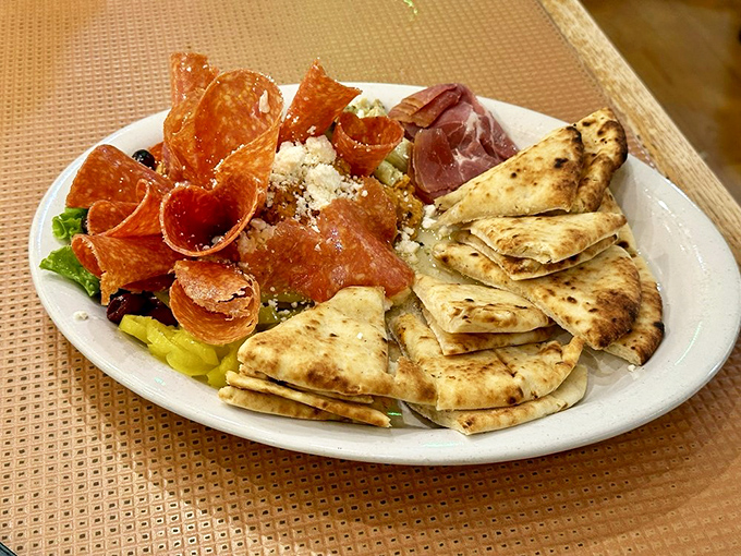The hummus platter arrives like a Mediterranean vacation for your taste buds, no passport required—just a healthy appetite and willing companions.