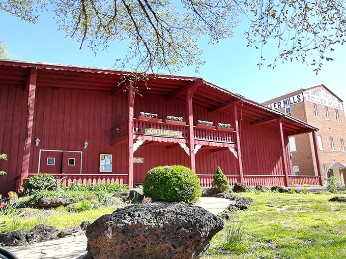 The Old Mill's weathered red boards tell tales of pioneer ingenuity. This isn't Disney's version of history—it's the real, flour-dusted deal.