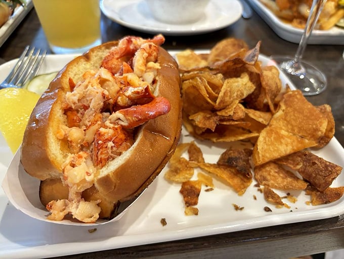 The lobster roll that launches a thousand road trips. Sweet chunks of lobster nestled in a perfect bun—worth every mile of the journey.