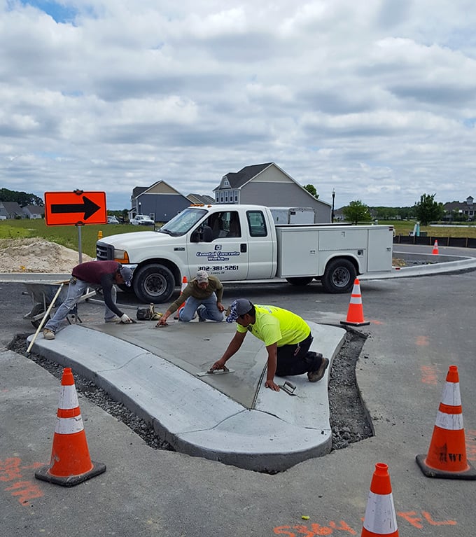 Craftsmanship in action – Bridgeville's growth happens one carefully finished concrete corner at a time, built by local hands.