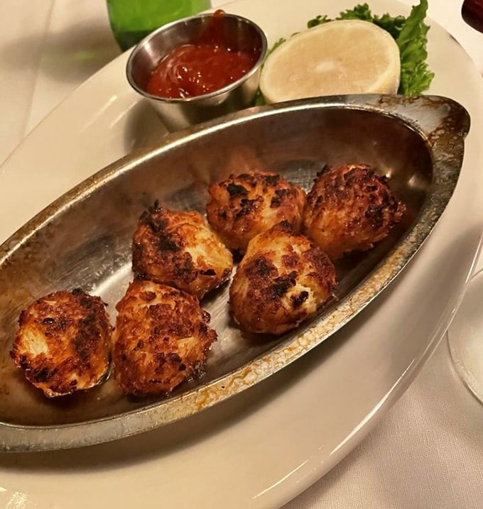 These crab balls aren't just appetizers – they're Maryland's answer to "what if perfection came in bite-sized form?"