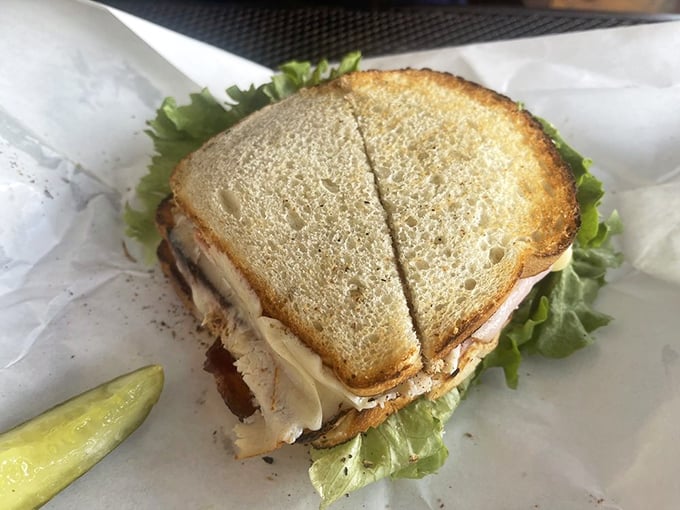 The Mitchell Club doesn't need a membership fee—just an appetite for excellence. This layered beauty makes ordinary club sandwiches hang their heads in shame.
