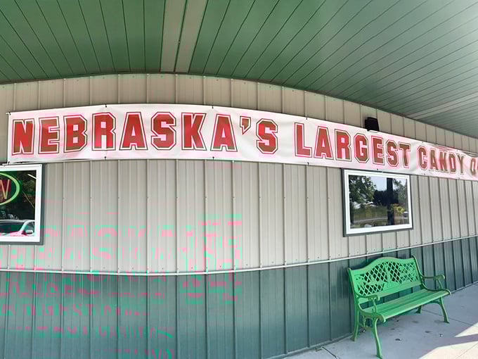 "Nebraska's Largest Candy Outlet" isn't just a boast—it's a promise. The green bench invites you to savor your treats before hitting the road.