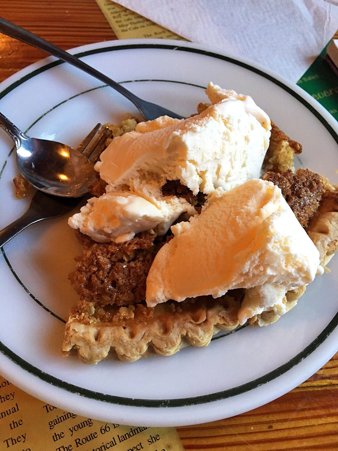Oatmeal pie with ice cream melting into every warm crevice—proof that dessert is not just a meal course but a spiritual experience.