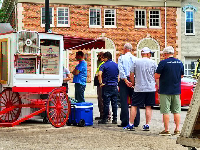 Business executives stand shoulder-to-shoulder with blue-collar workers—the Hamburger Wagon: democracy's most delicious waiting line. 