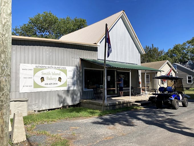The bakery's metal siding gleams in Maryland sunshine, while a parked golf cart hints at the island's unhurried pace – just slow enough to savor every bite.