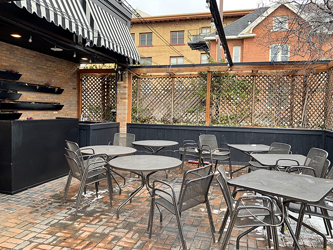 The brick-paved patio offers a perfect urban oasis for enjoying your cheesecake while contemplating life's important questions—like "Should I order seconds?"