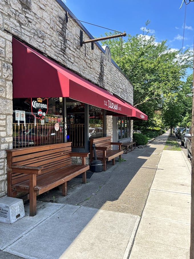 Wooden benches outside aren't just seating – they're the waiting room for burger paradise, where anticipation builds with every passing minute.