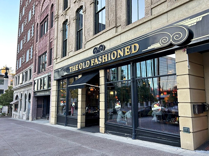 The exterior at dusk – when The Old Fashioned transforms from daytime institution to evening sanctuary, its windows glowing with the promise of Wisconsin hospitality.