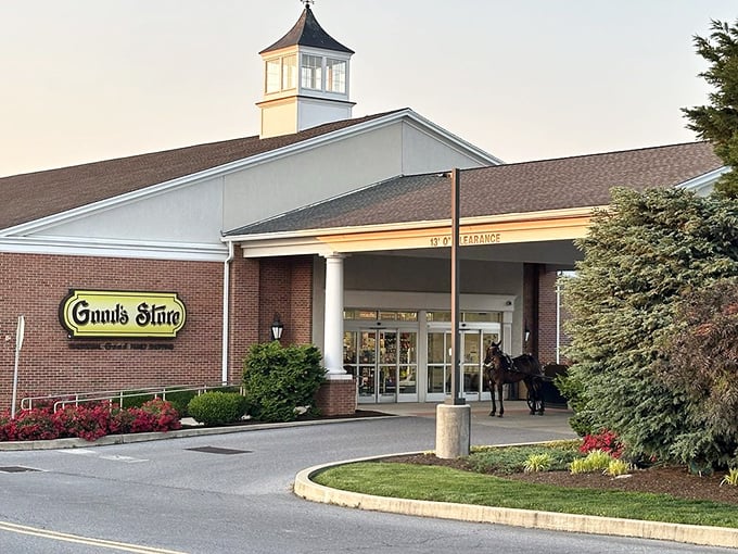 Beyond the main entrance, the Good's Store offers another shopping adventure—complete with the occasional horse and buggy parked outside for authenticity.